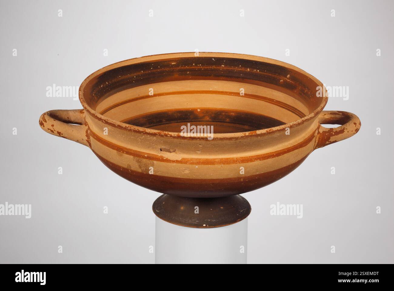 This terracotta kylix is a drinking cup from East Greece, dating to the ...