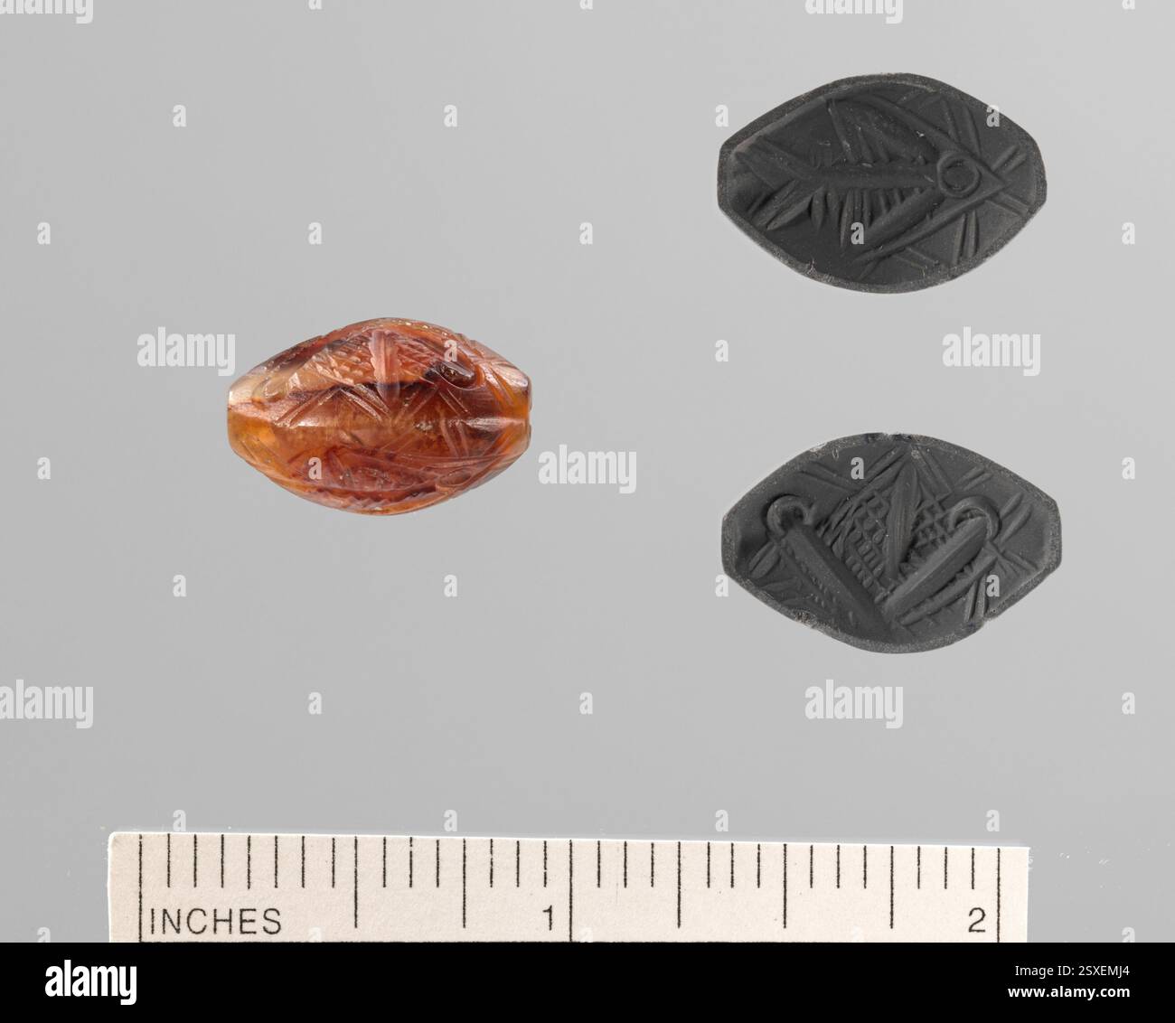 This Minoan Sard Prism gem (ca. 1650–1500 BCE) features a design ...