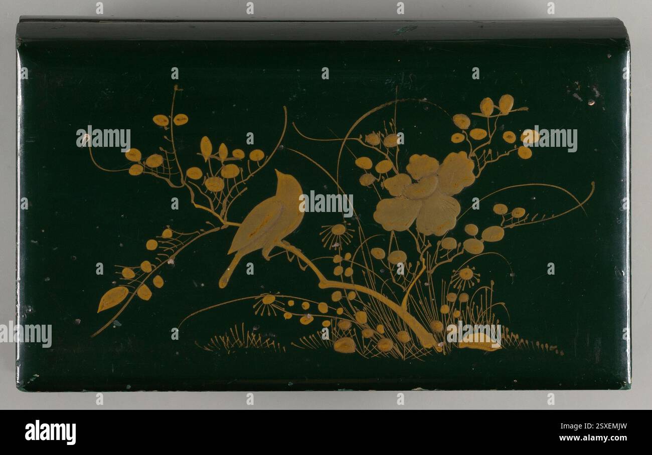 This locking biscuit box, shaped like a book, was produced between 1872 ...