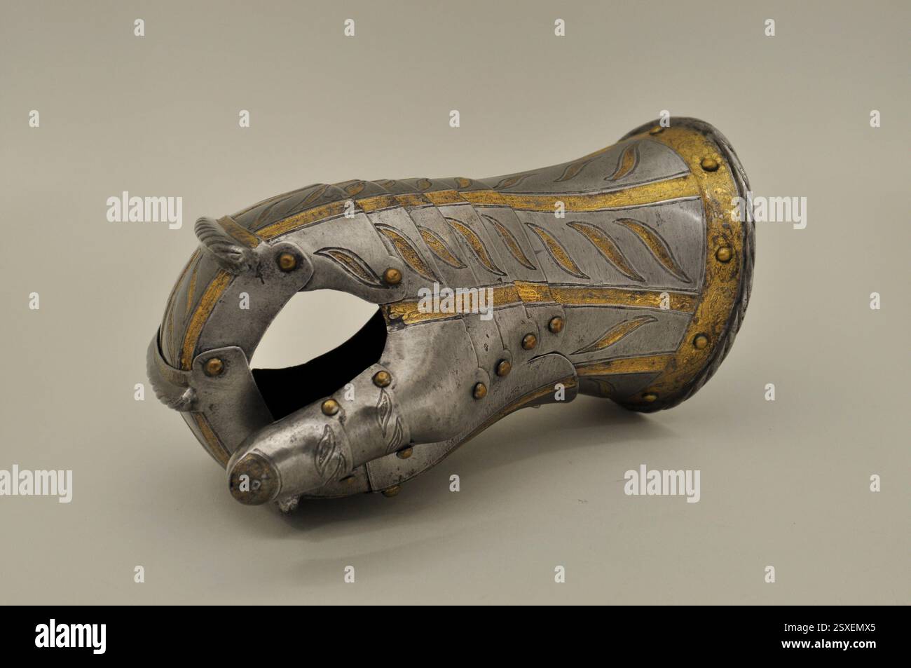 This German locking gauntlet from the mid-16th century features ...