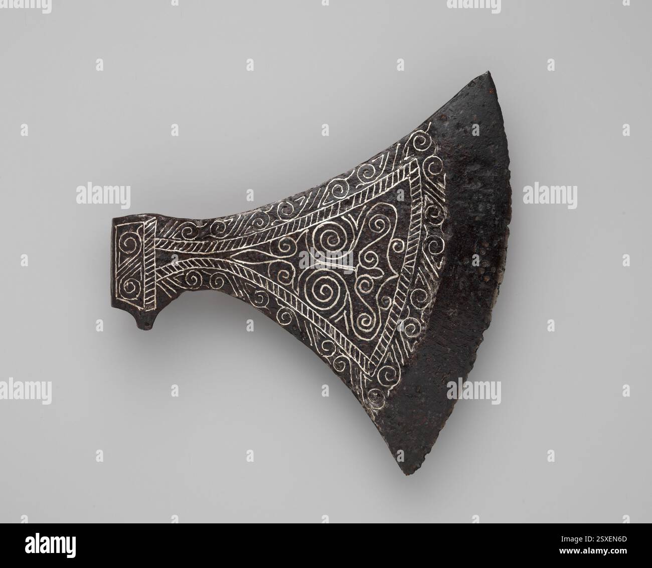 This Viking ax head from the 11th–12th century is a rare example of a ...
