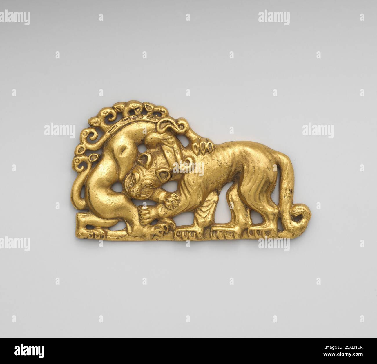 Electrotype reproduction of a gold plaque featuring an animal combat ...