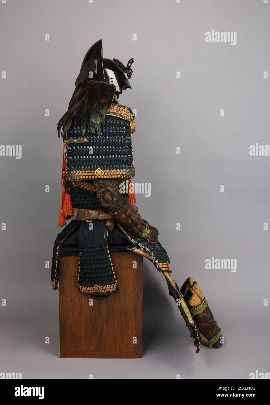 A Japanese helmet from the 19th century, featuring a rain protector and ...