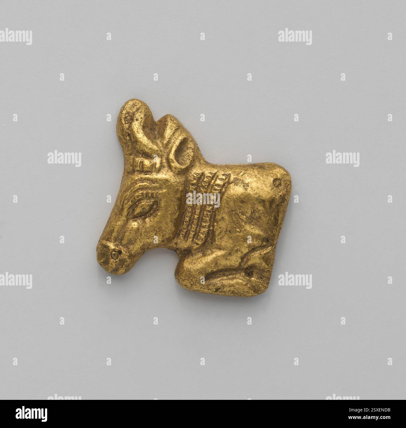 A 19th-century electrotype reproduction of a gold plaque featuring a ...