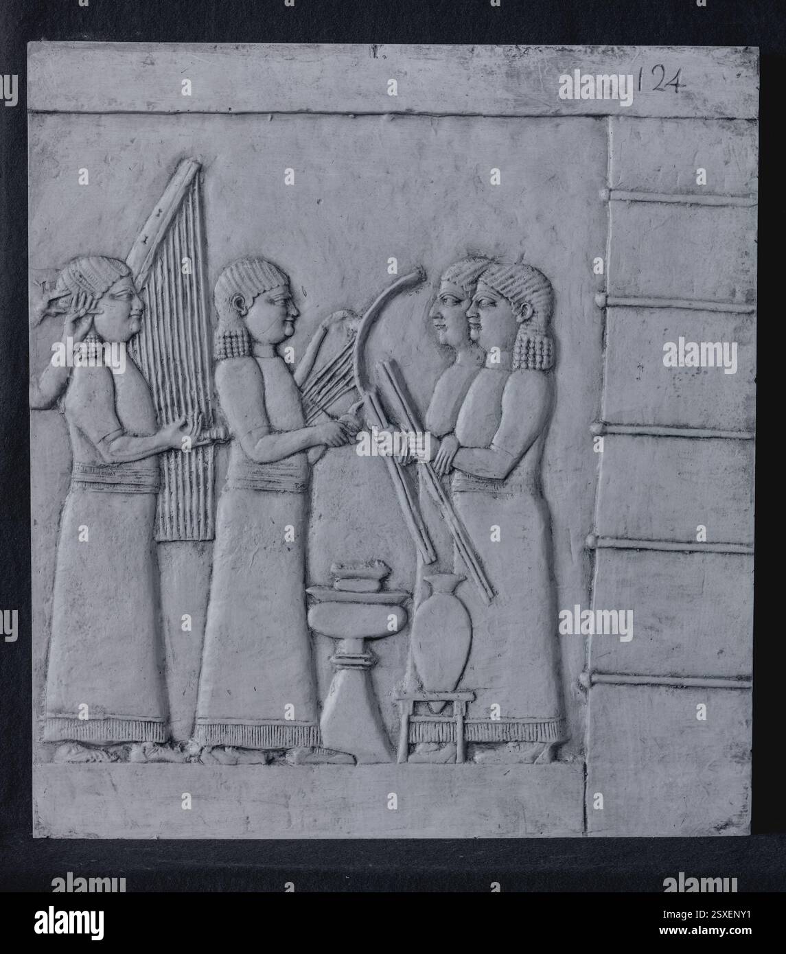 A cast of relief depicting musicians from the 7th-century BCE Assyrian ...