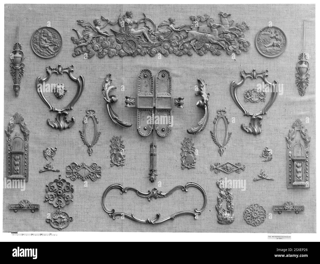 This pair of French rosettes from the early 19th century is crafted ...