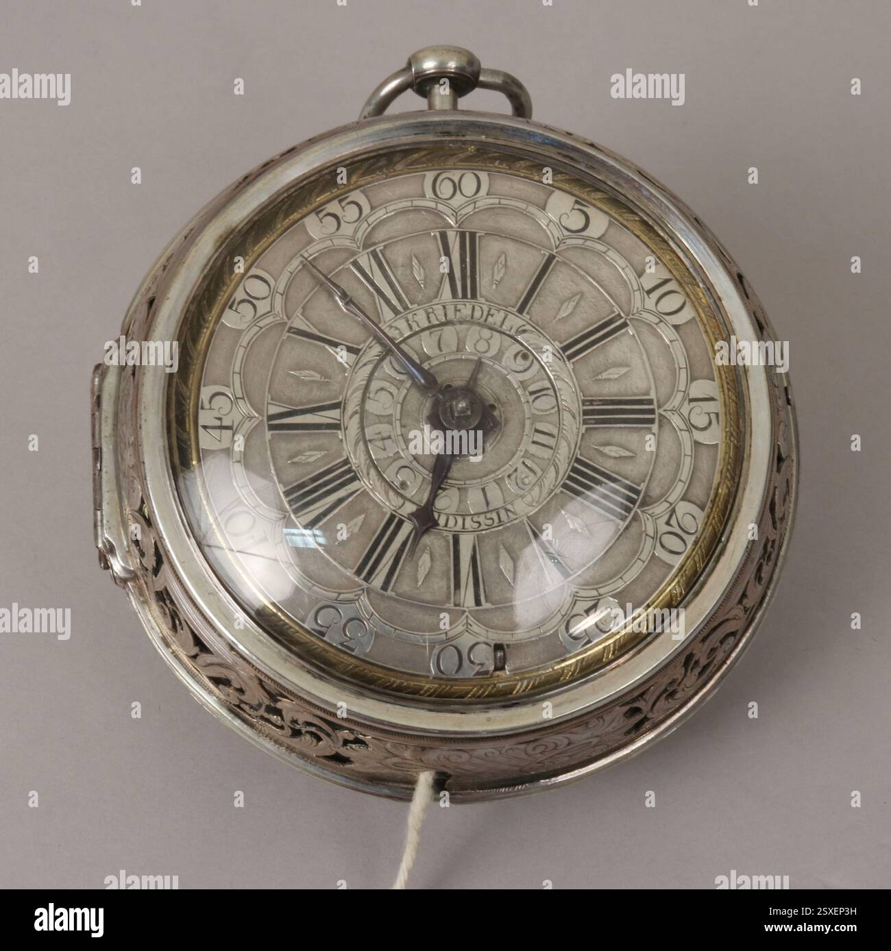 This early 18th-century German watch clock, made by watchmaker Johann ...