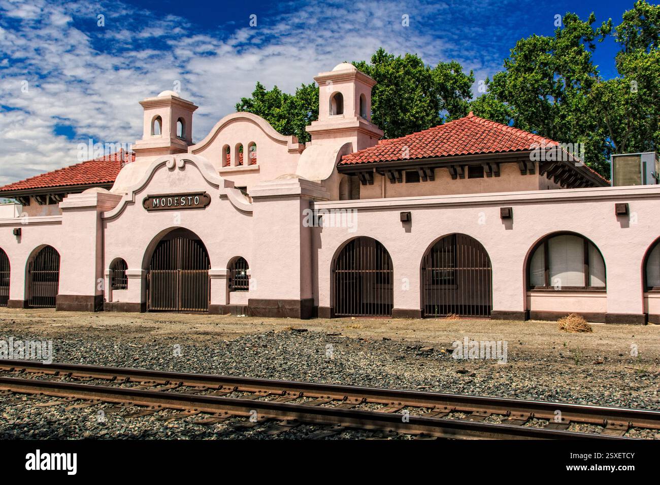 Train station with a red roof and white walls. The roof is made of red ...