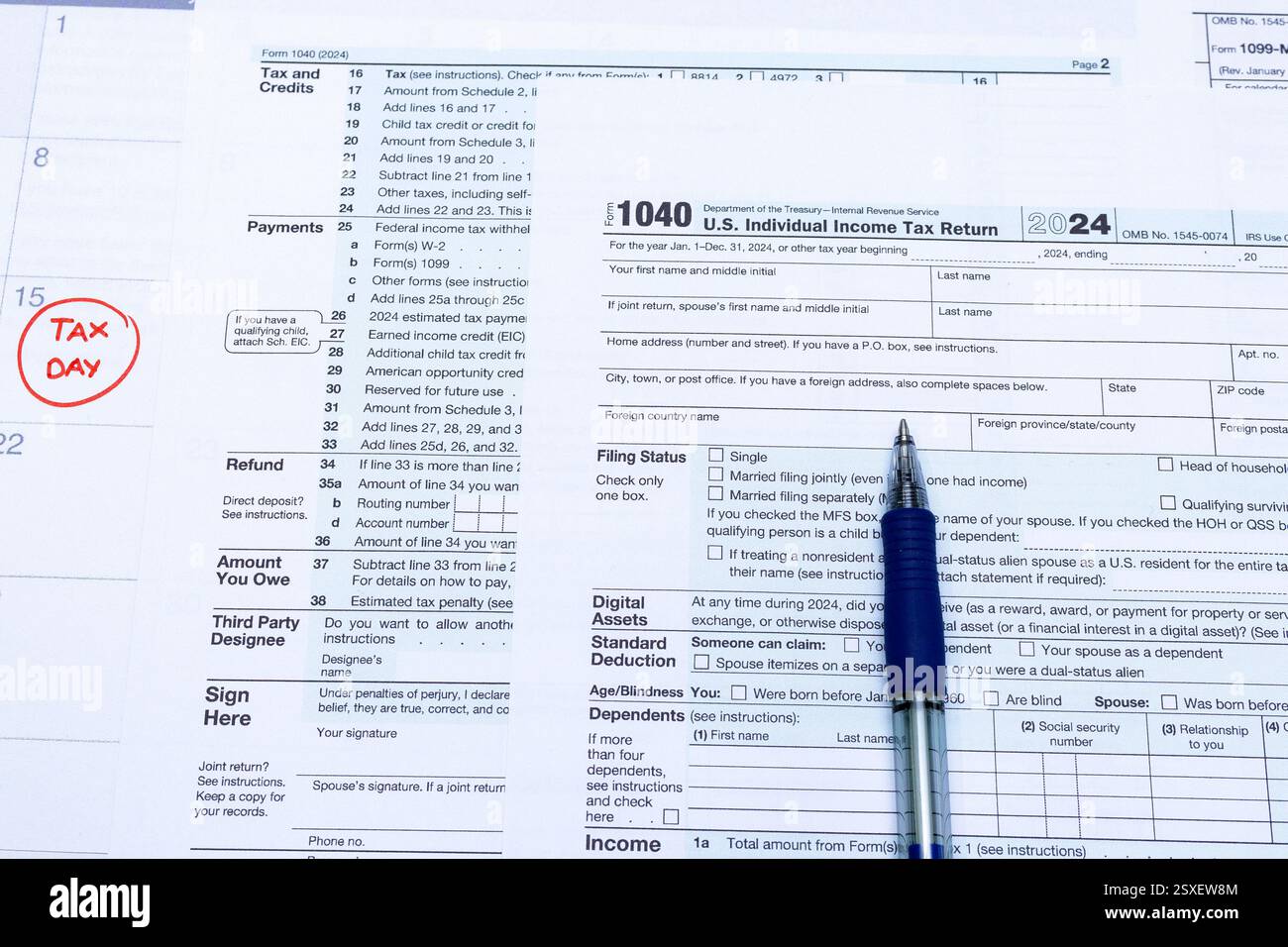A close-up of U.S. tax forms, including the 1040 individual income tax ...