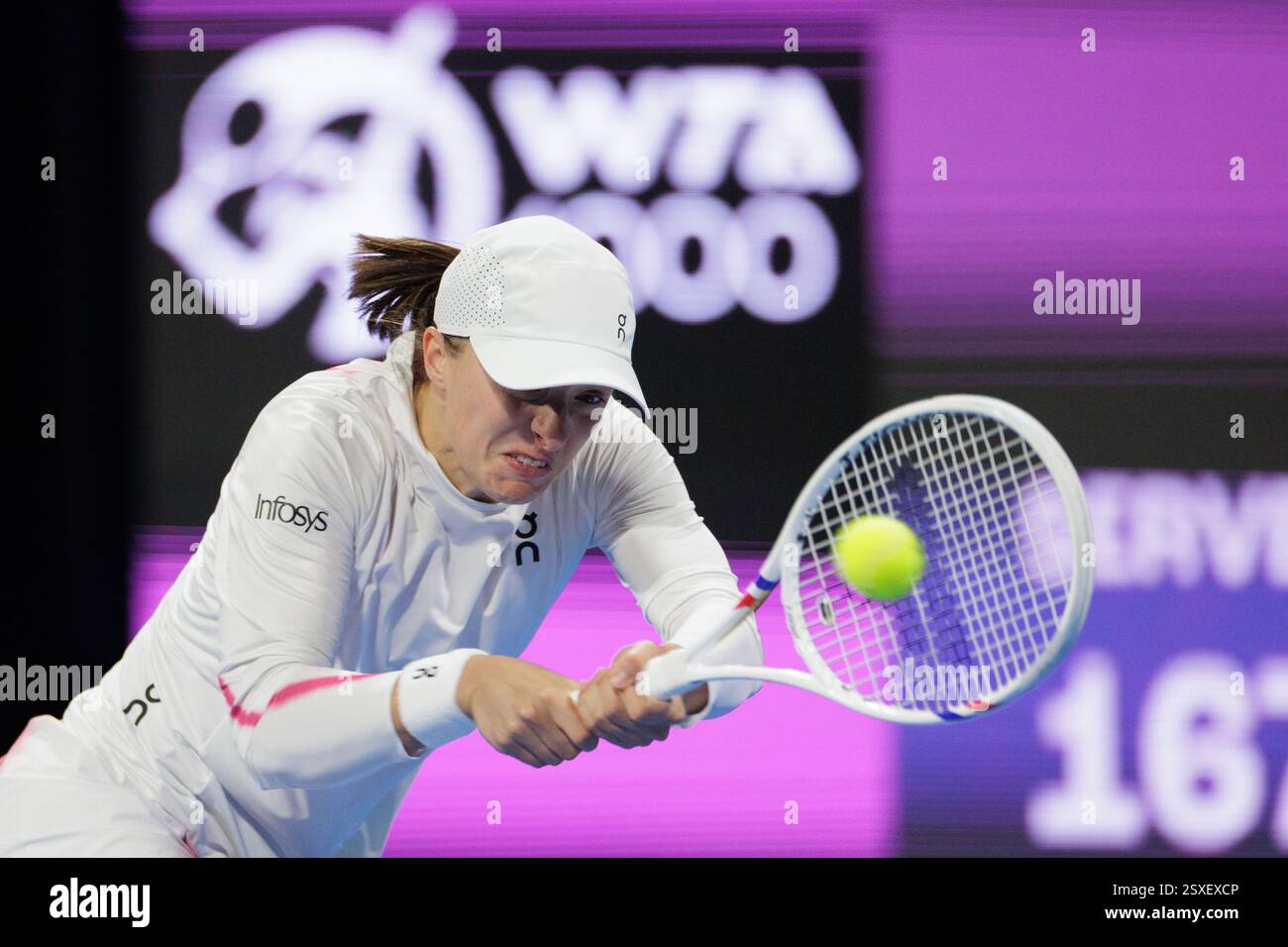 Iga Swiatek of Poland during the Qatar TotalEnergies Open 2025, WTA ...