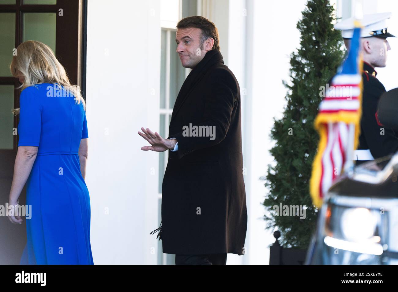 French President Emmanuel Macron is escorted by Chief of Protocol ...