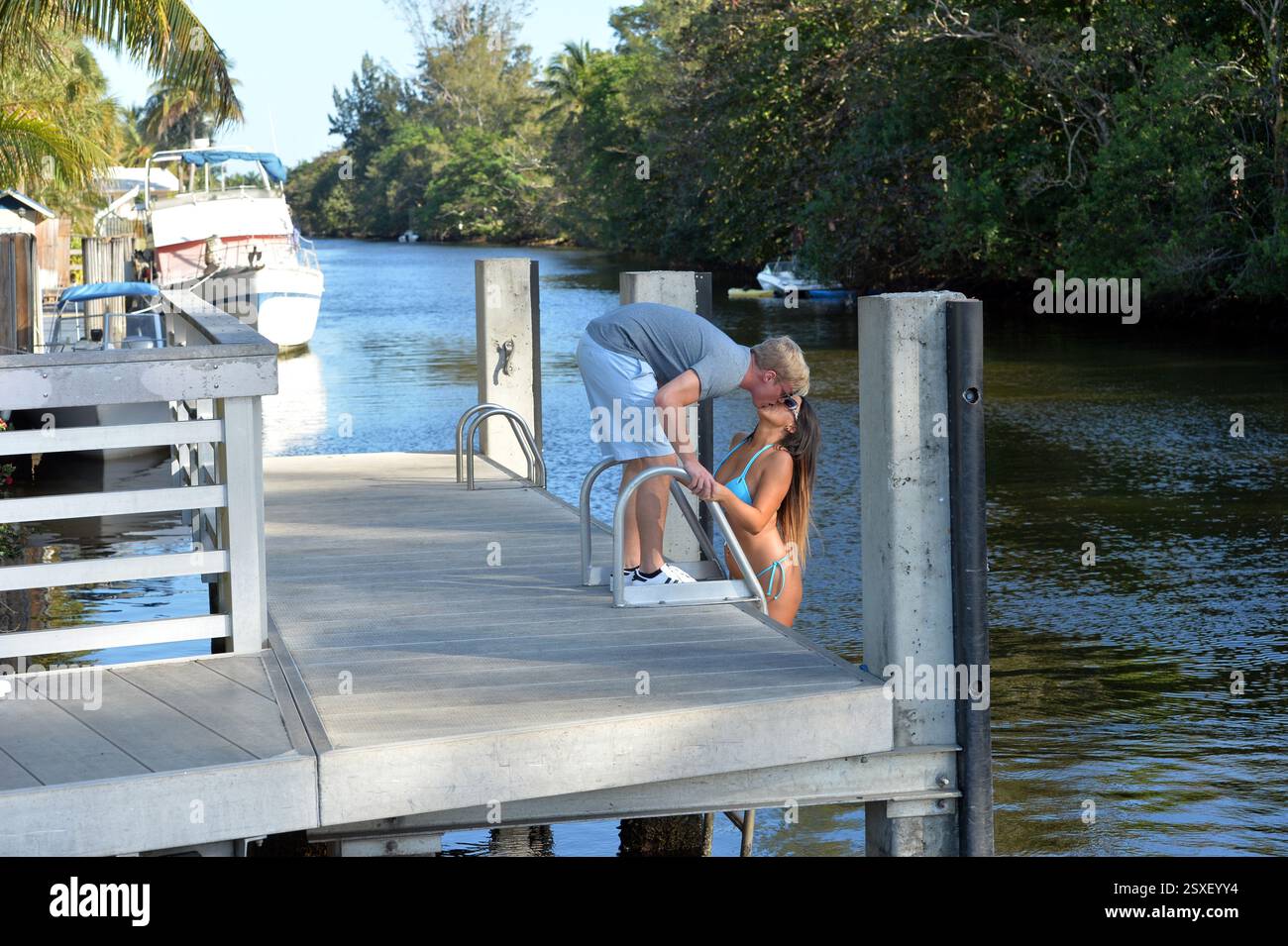 Italian model and star of French Reality show Secret Story 9 Claudia Romani seen kissing her new ...