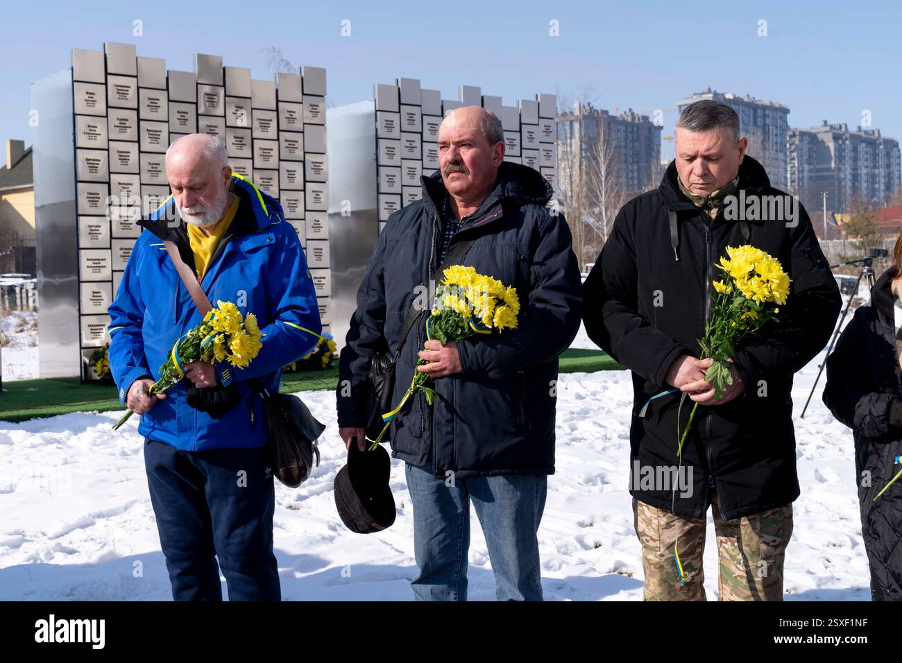 Ceremony honoring killed civilians at the site of a mass grave in Bucha ...