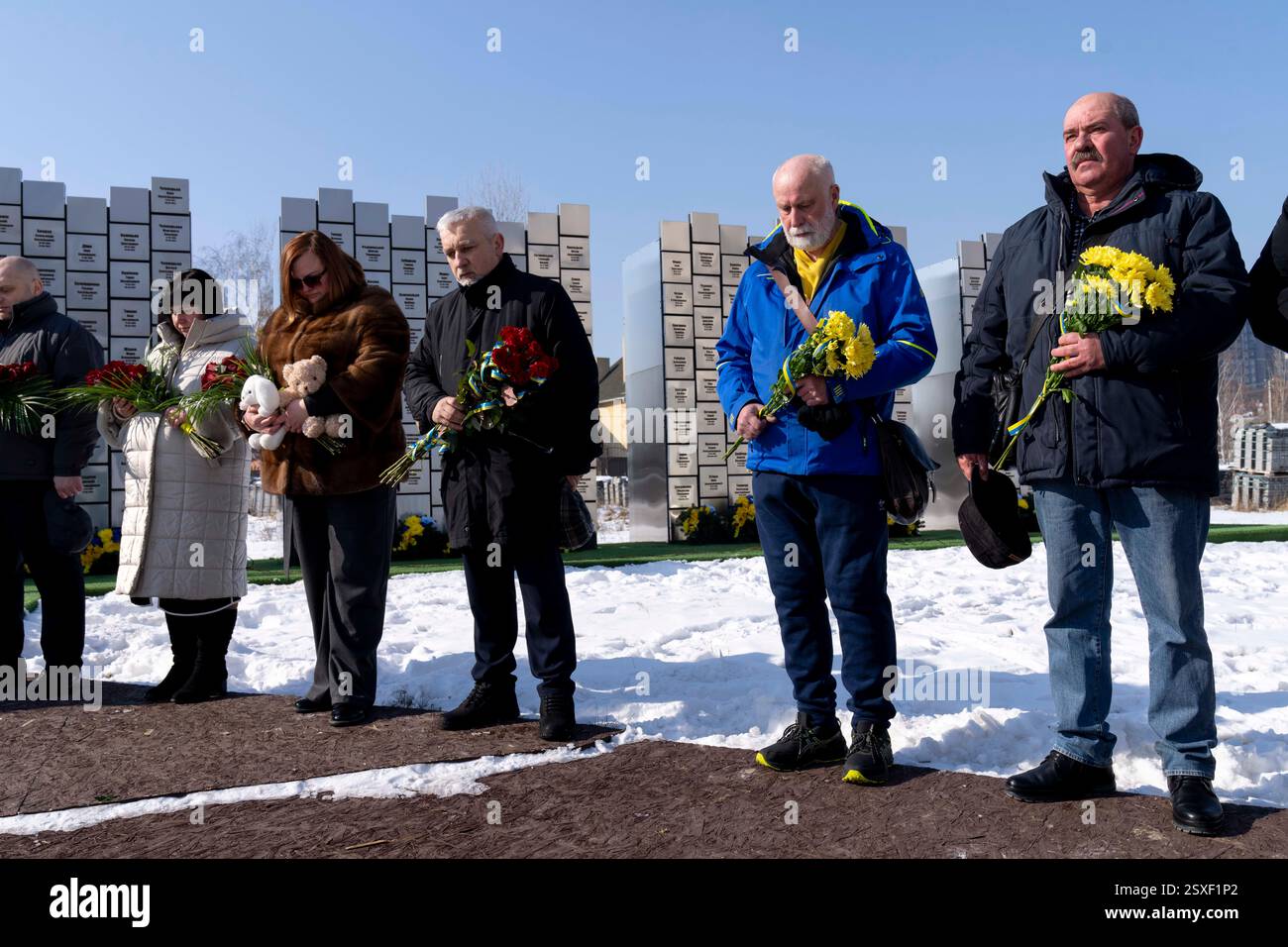 Ceremony honoring killed civilians at the site of a mass grave in Bucha ...