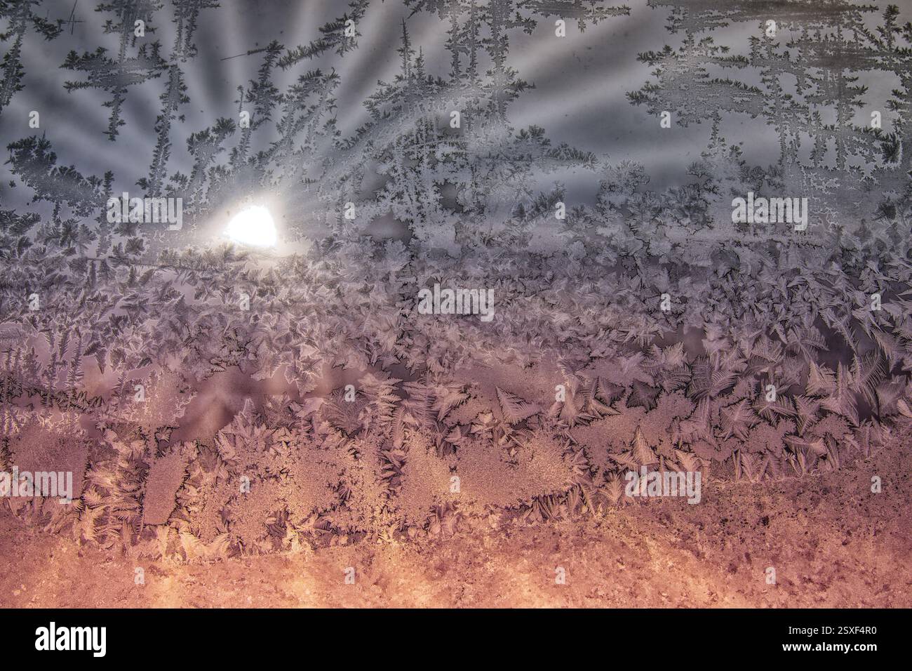 Sunrise through Frosted Window - warm and cool Stock Photo - Alamy