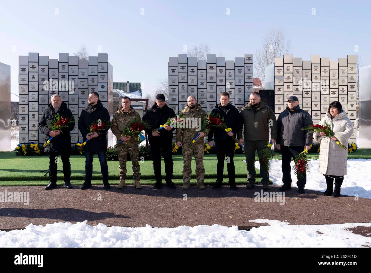 Ceremony honoring killed civilians at the site of a mass grave in Bucha ...