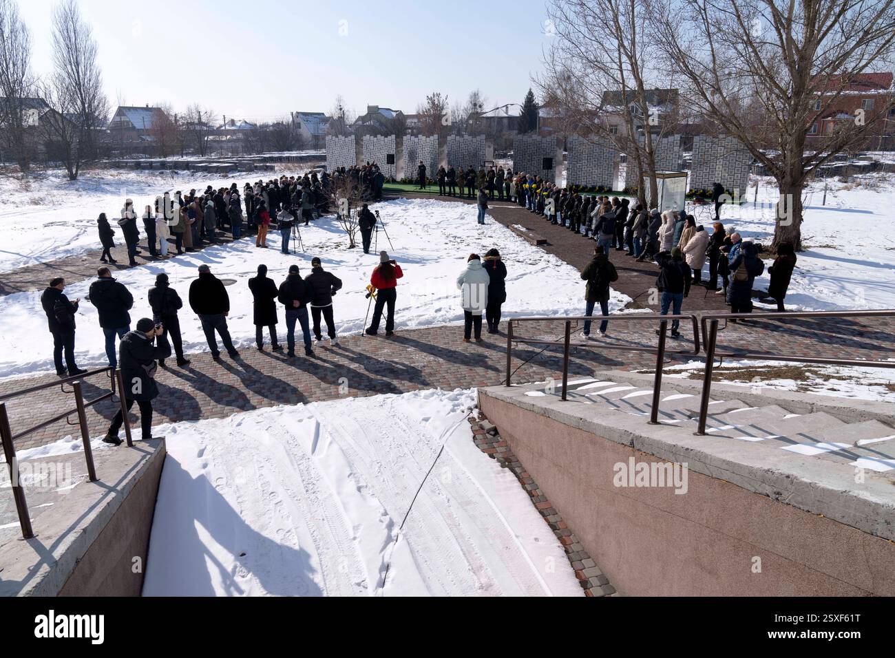 Ceremony honoring killed civilians at the site of a mass grave in Bucha ...