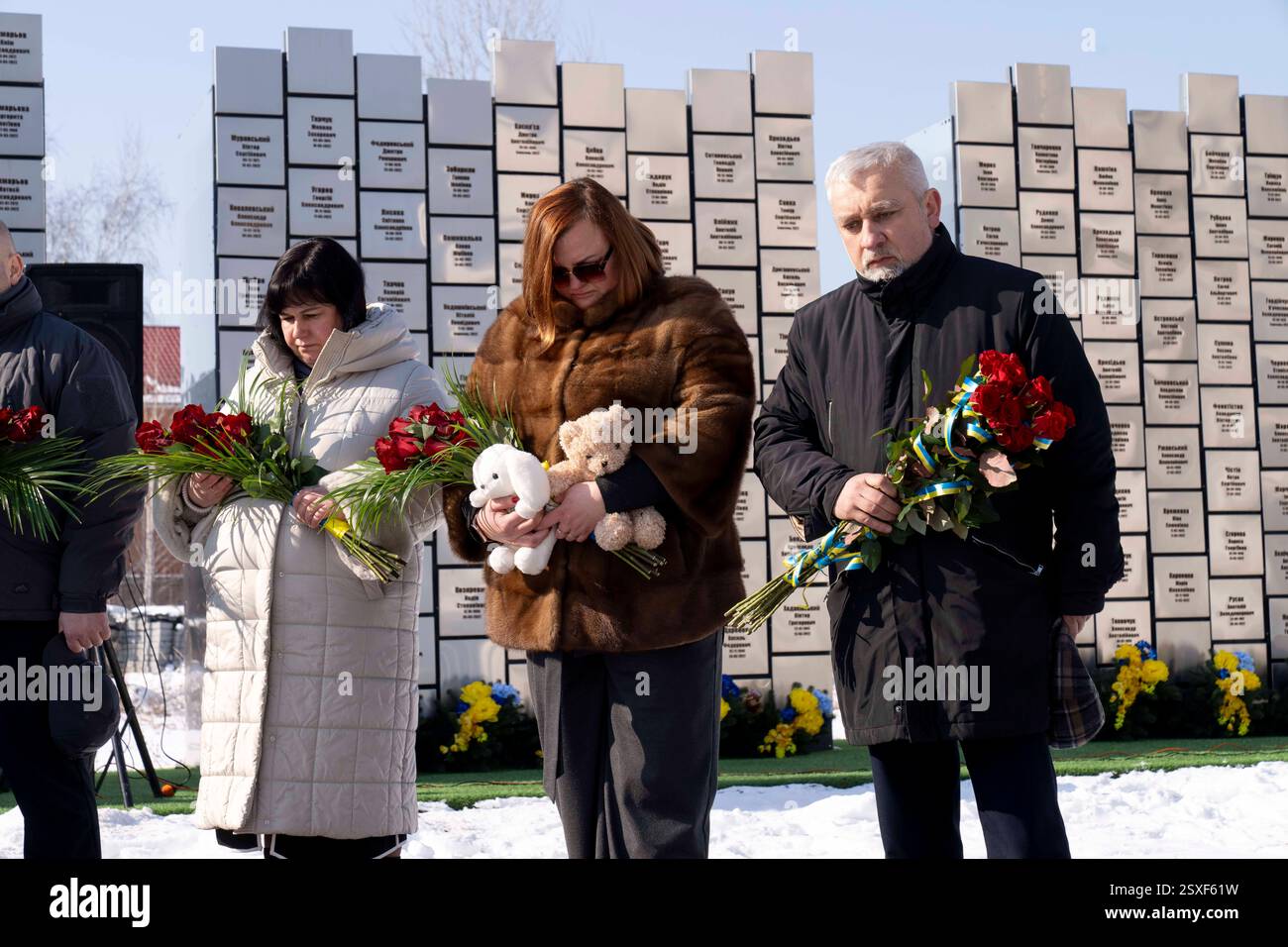 Ceremony honoring killed civilians at the site of a mass grave in Bucha ...