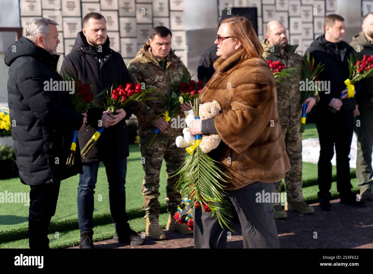 Ceremony honoring killed civilians at the site of a mass grave in Bucha ...