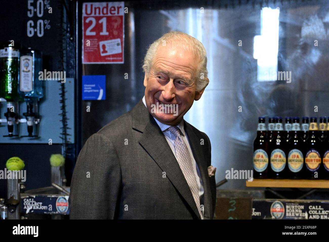 King Charles III, during a visit to Tower Brewery in Burton Upon Trent, Staffordshire, an ...
