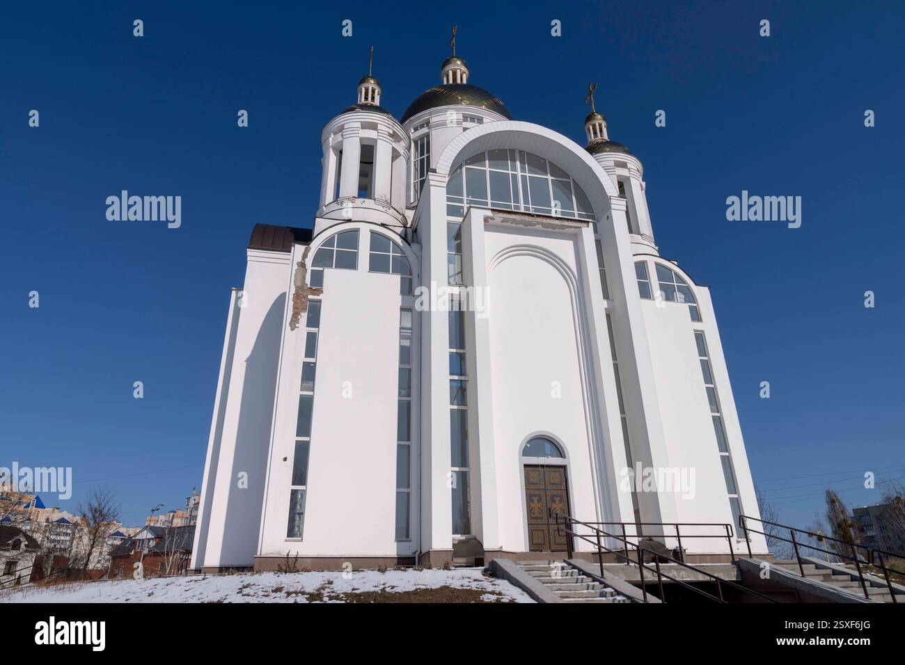 Church seen during ceremony honoring killed civilians at the site of a ...