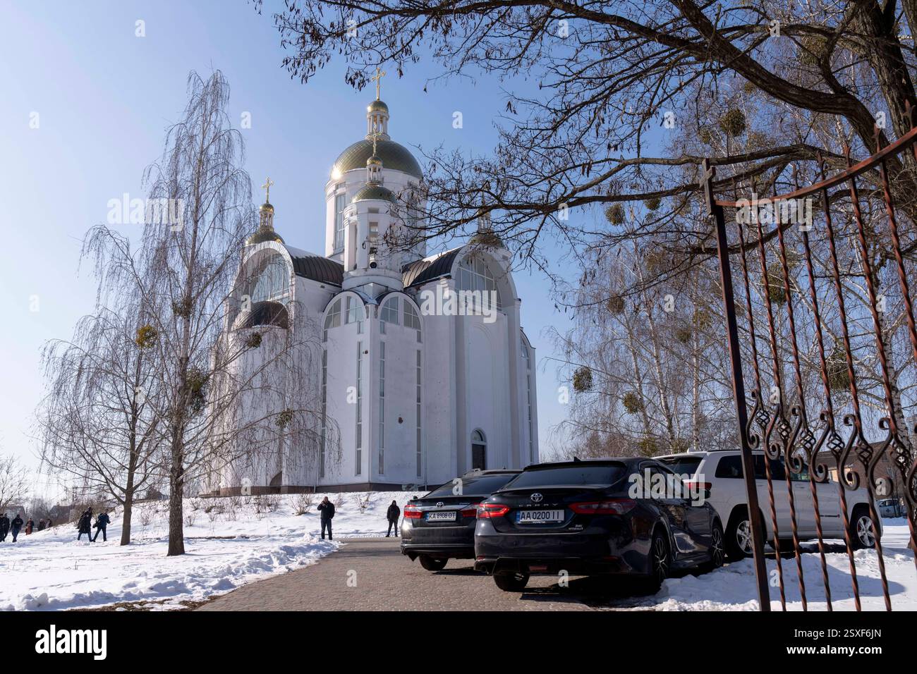 Church seen during ceremony honoring killed civilians at the site of a ...