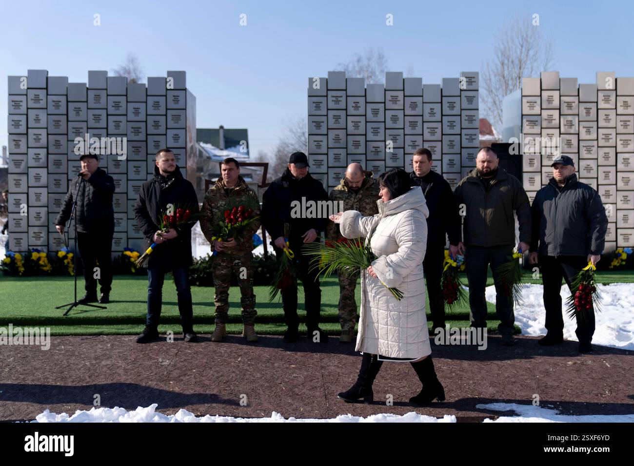 Ceremony honoring killed civilians at the site of a mass grave in Bucha ...