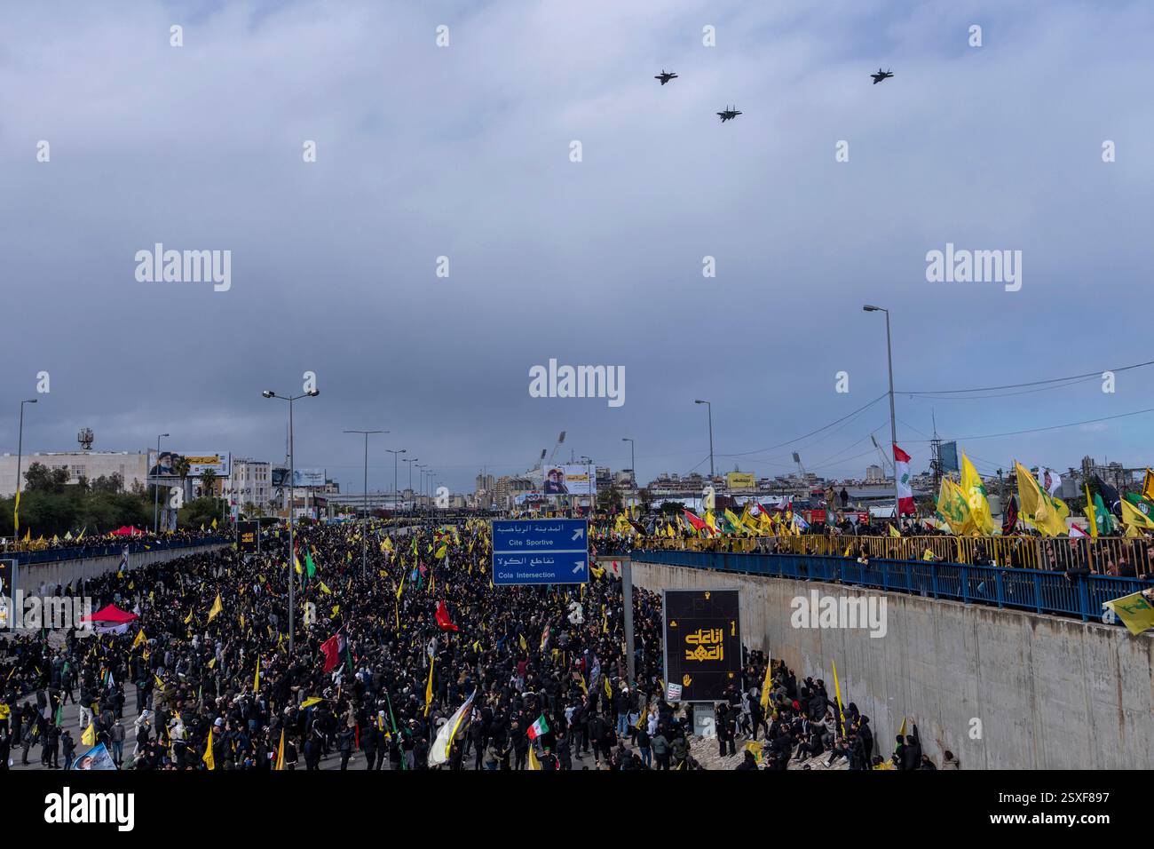 Israeli fighter jets fly over the city during the funeral procession of ...