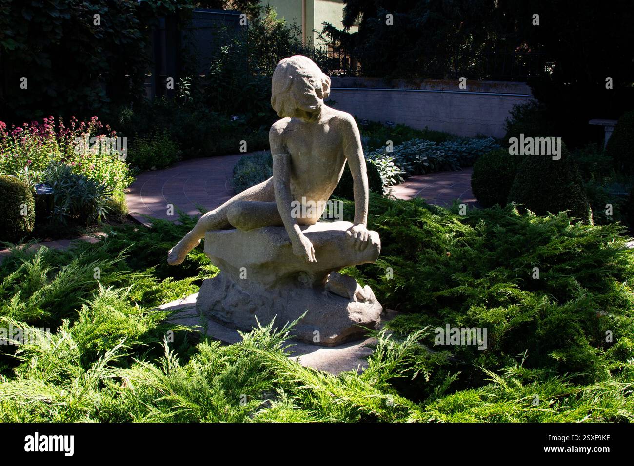 Ethereal Bronze Sculpture with Trickling Fountain in a Garden. Classic ...