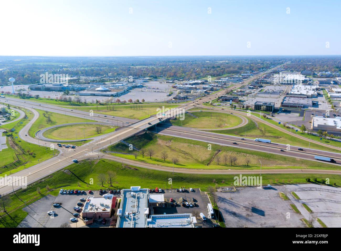 Aerial perspective of complex traffic interchange with busy roads ...