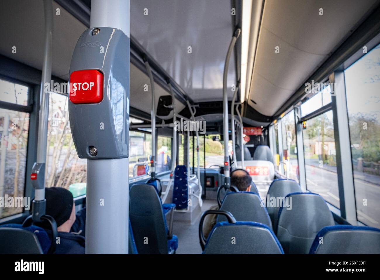 Stop button, with braille, inside bus Stock Photo - Alamy
