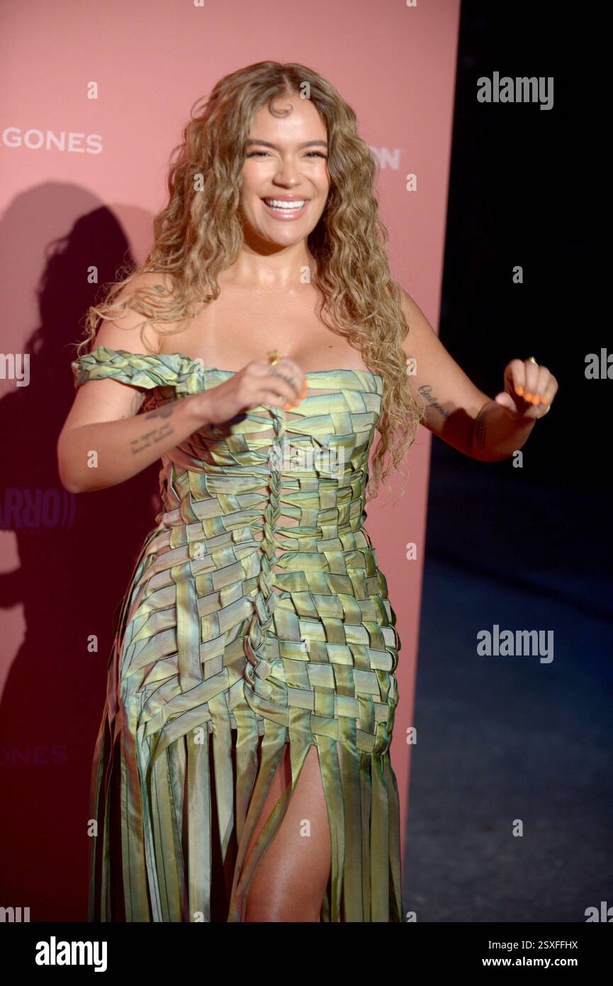 Miami, Florida, USA. 22nd Feb, 2025. Karol G attends Karol G's Con Cora Foundation's Con Cora ...