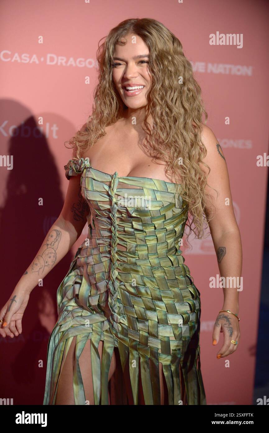 Miami, Florida, USA. 22nd Feb, 2025. Karol G attends Karol G's Con Cora Foundation's Con Cora ...