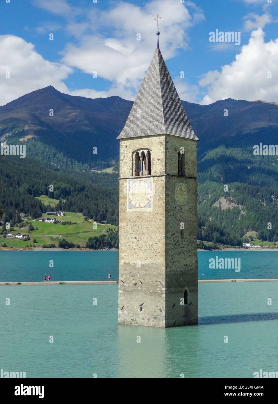 The bell tower in Lake Reschen, an artificial lake in South Tyrol ...