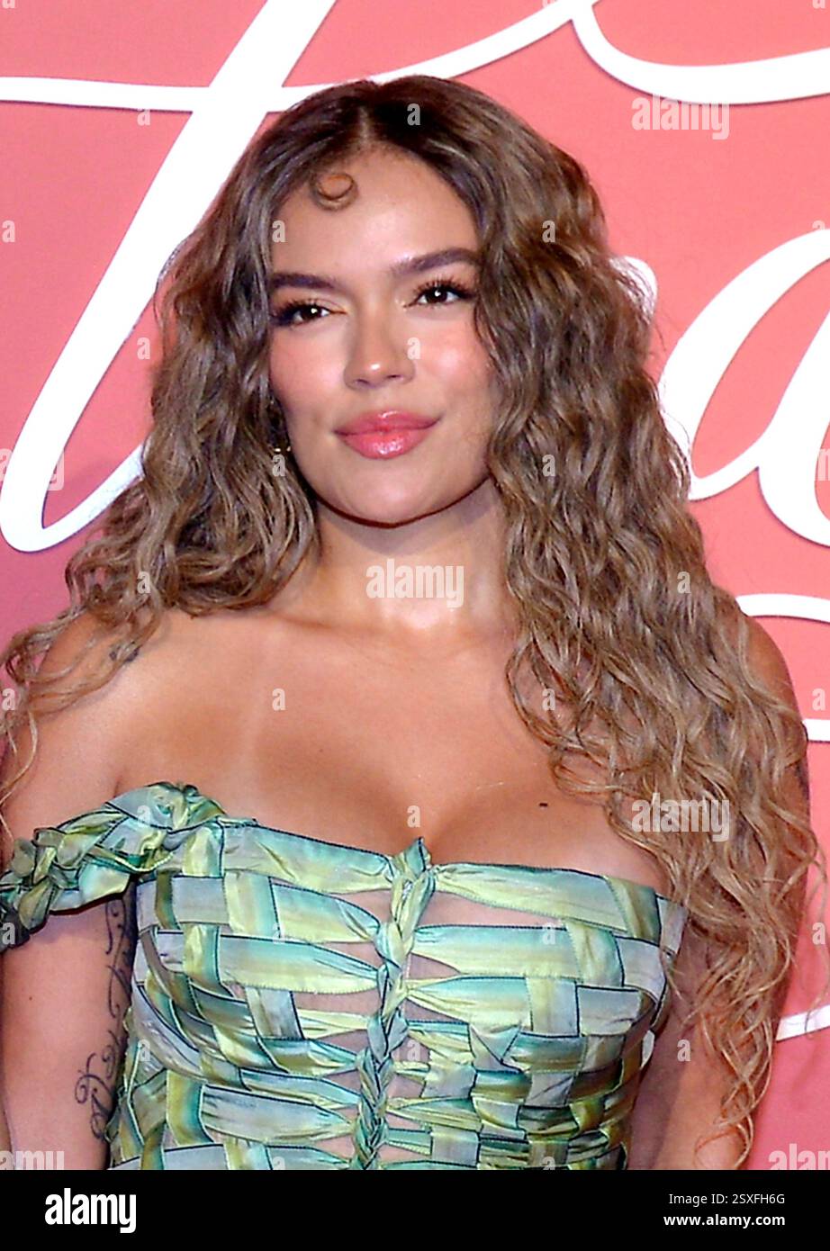 Miami, Florida, USA. 22nd Feb, 2025. Valentina Bueno and Karol G attend Karol G's Con Cora ...