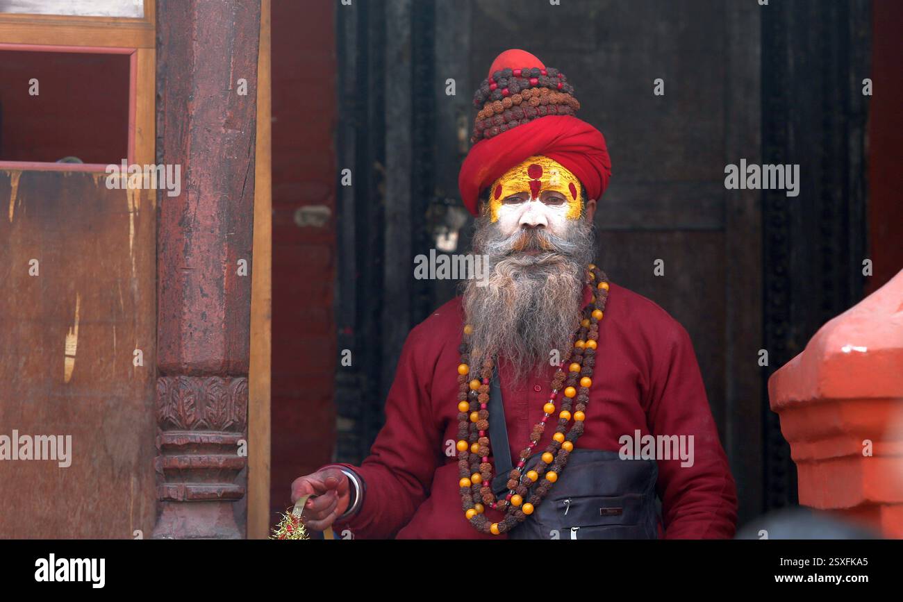 February 24, 2025: A Sadhu (holy man) rests ahead of the Maha ...