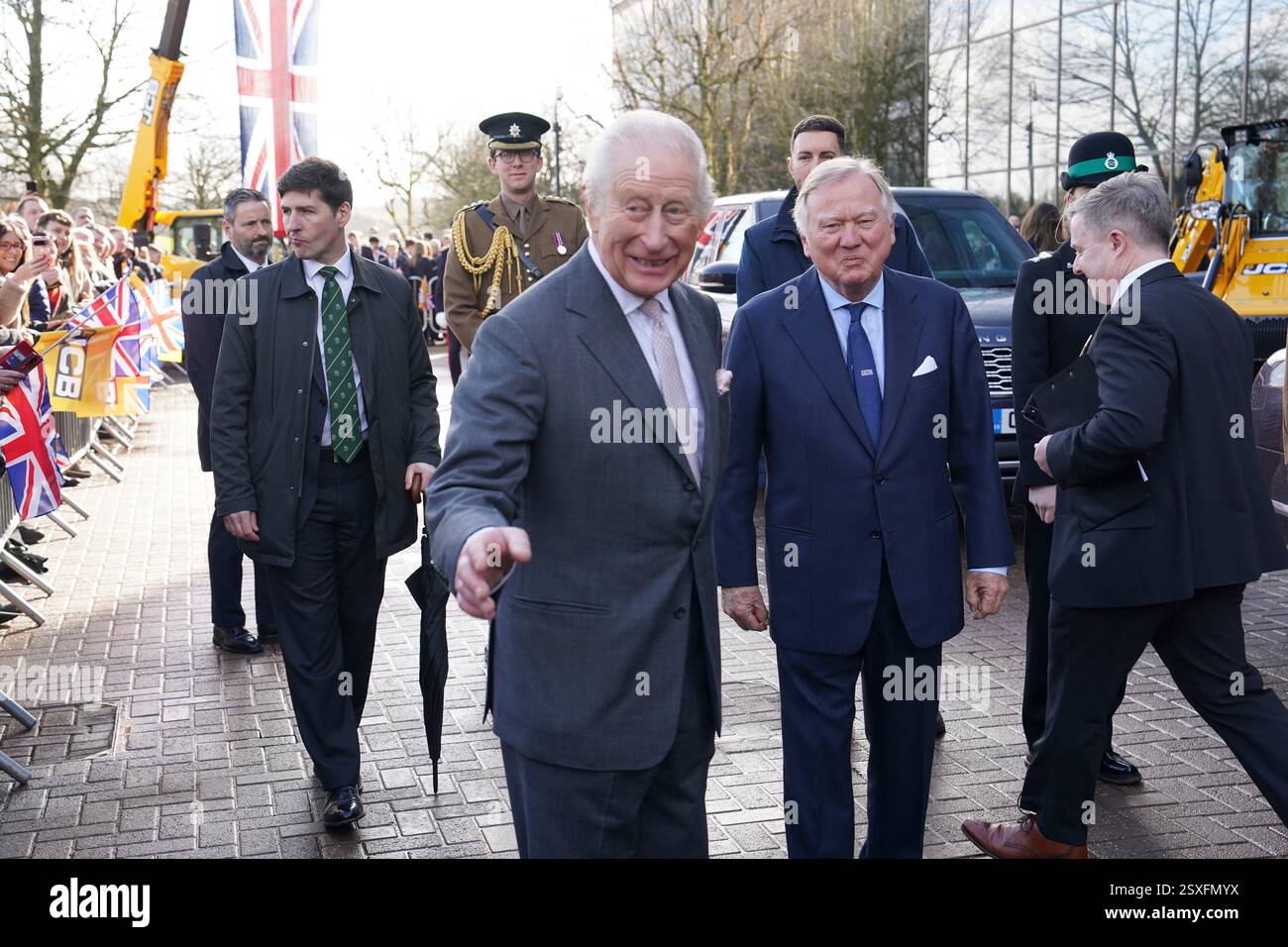 King Charles III with Lord Bamford during a visit to JCB World ...