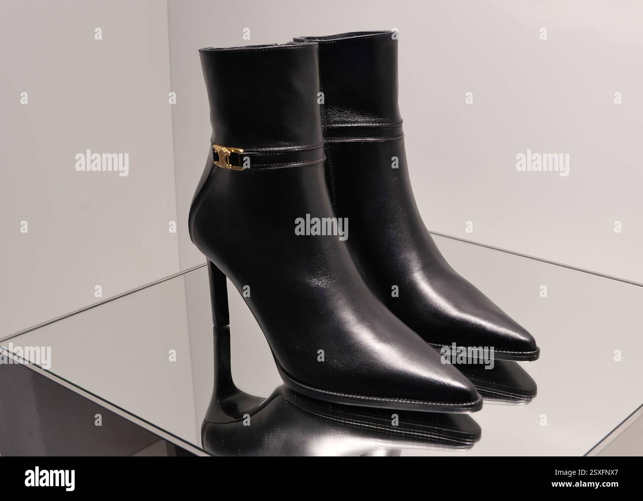 CELINE BOOTS FOR WOMAN ON DISPLAY INSIDE THE FASHION BOUTIQUE Stock ...