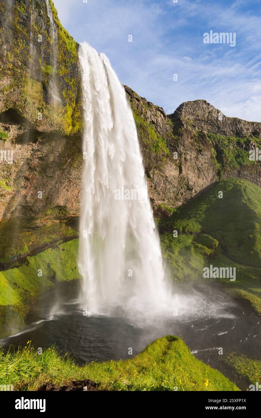 Waterfall in an Icelandic landscape Stock Photo - Alamy