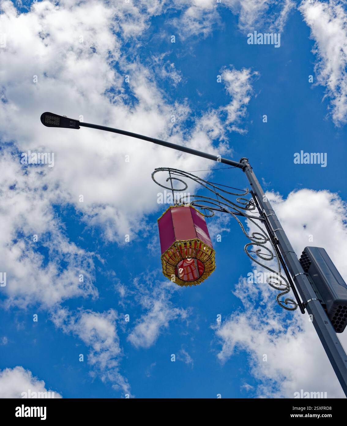 Chinese red lantern attached to street light pole at corner of Worth ...