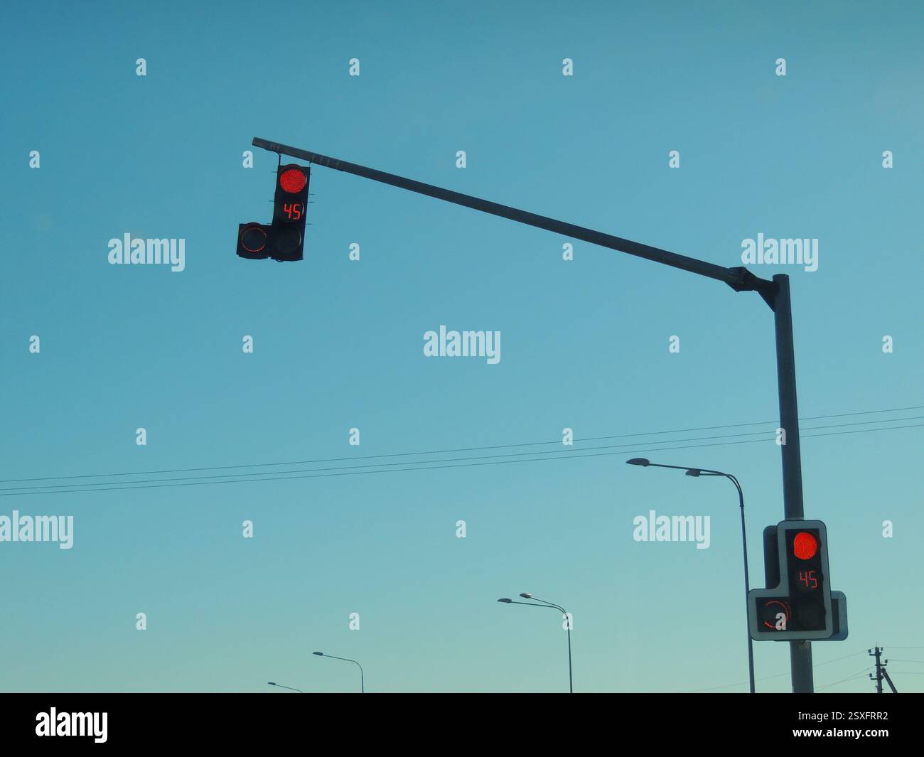 overhead traffic light for cars and pedestrians with red signal color ...