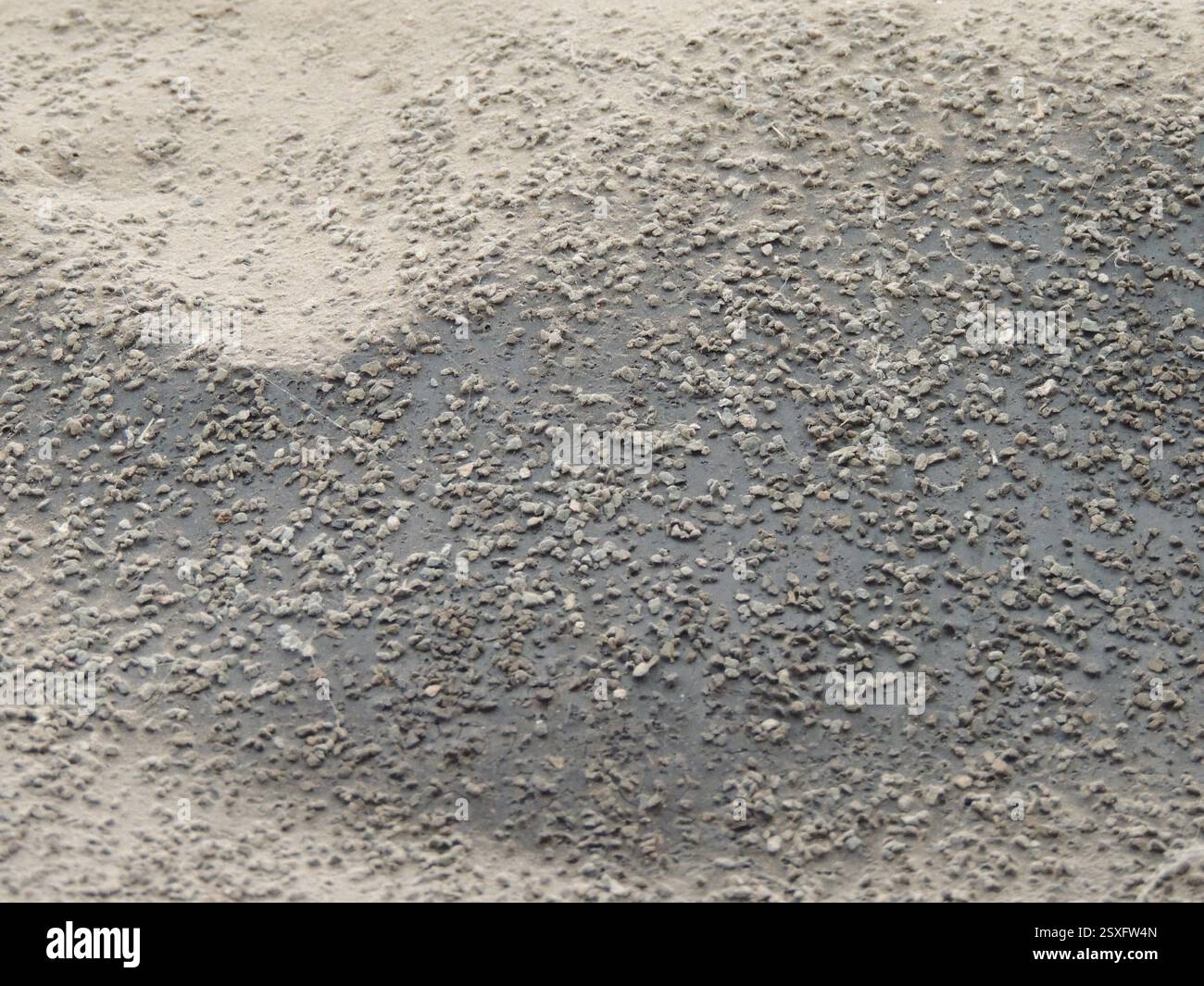 gray, dirty piece of roofing felt with crumbs and dust as abstract ...