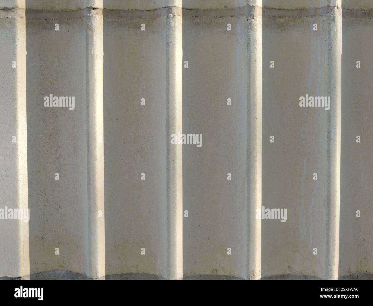 gray ribbed textured background with vertical stripes, fragment of ...