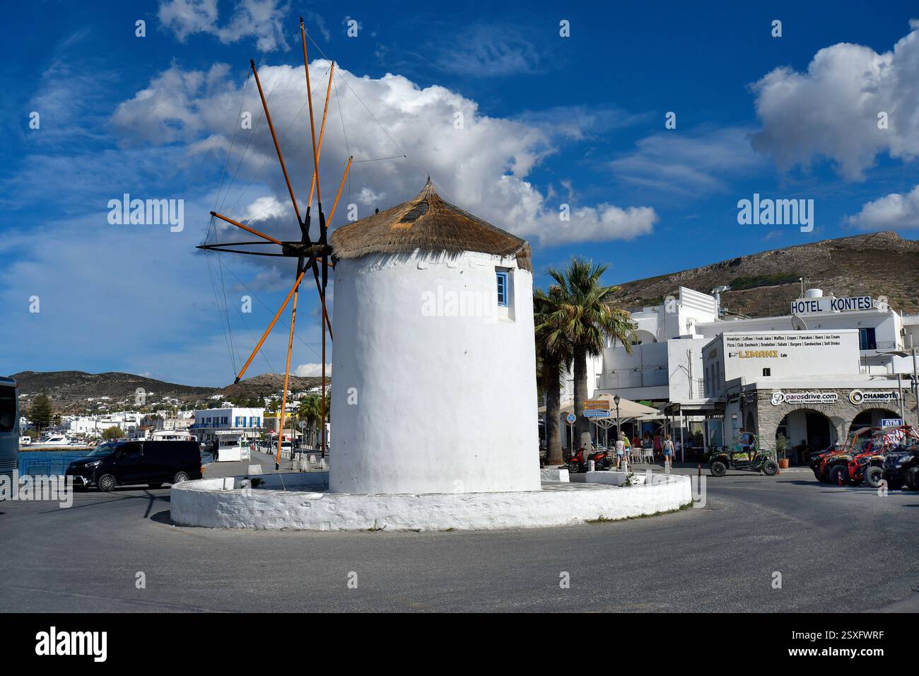 Paros, Greece - September 18, 2024: Unknown people and shops around the ...