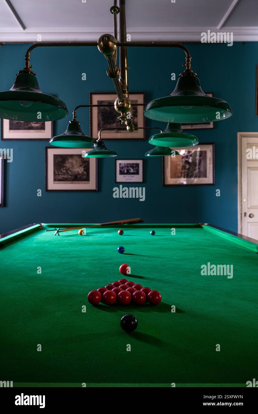 Green billiards table with pool balls in Bayfield Hall, 18th century ...