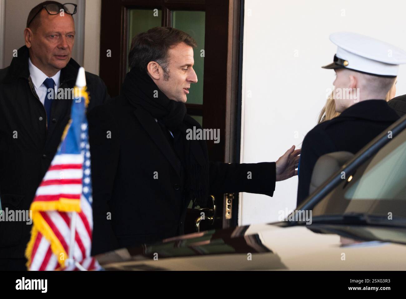 French President Emmanuel Macron leaves the White House, Monday, Feb ...