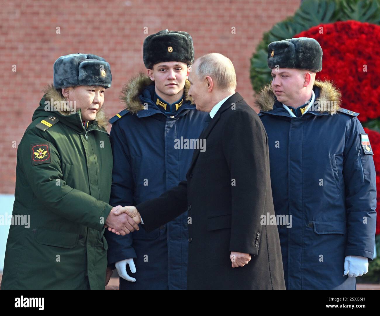 Moscow, Russia. 23rd Feb, 2025. From right to left: Lieutenant Alexander Puzanov, Russian ...