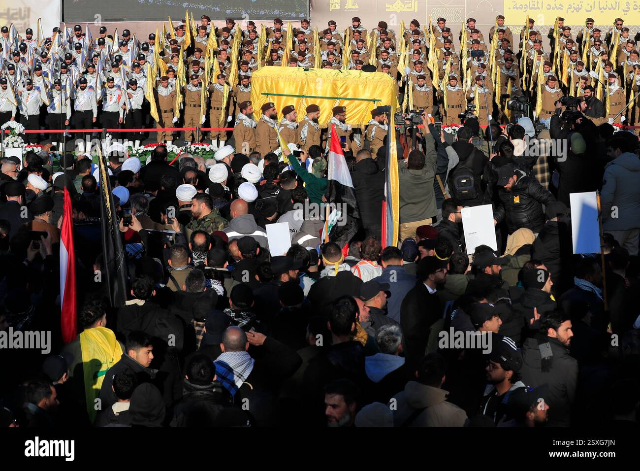 Hezbollah fighters carry the coffin of Slain Hezbollah Secretary ...