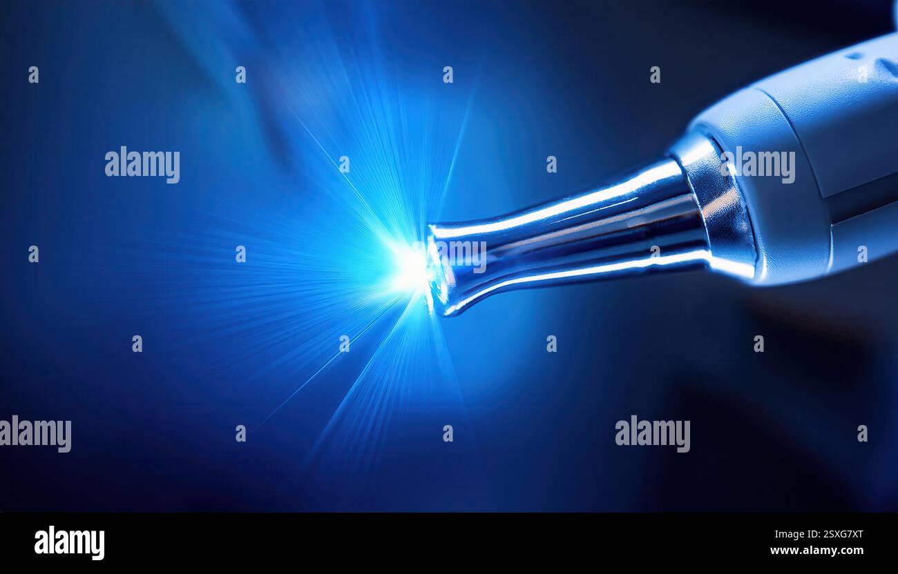 An advanced laser tool emits a blue beam, highlighting cutting edge ...