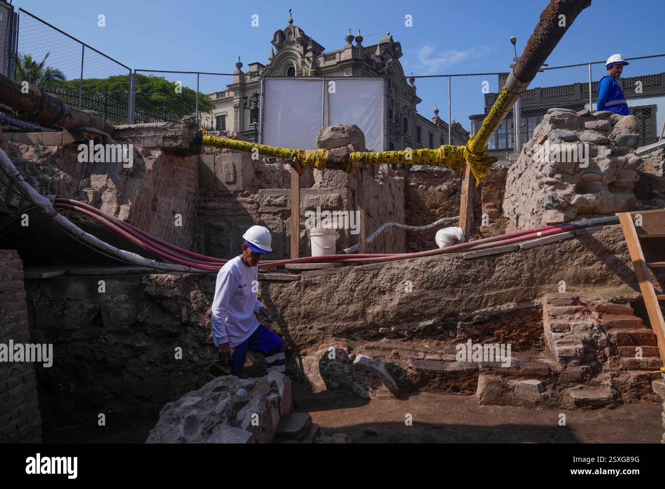 A worker stands inside what was once a colonial bridge from XVI century ...